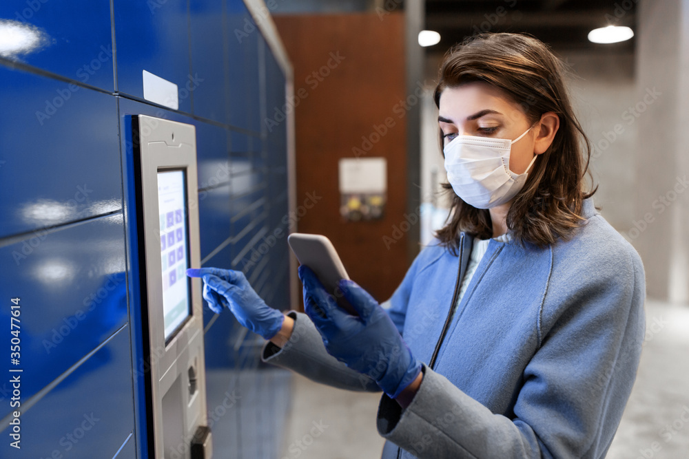 health care, mail delivery and pandemic concept - woman wearing face ...