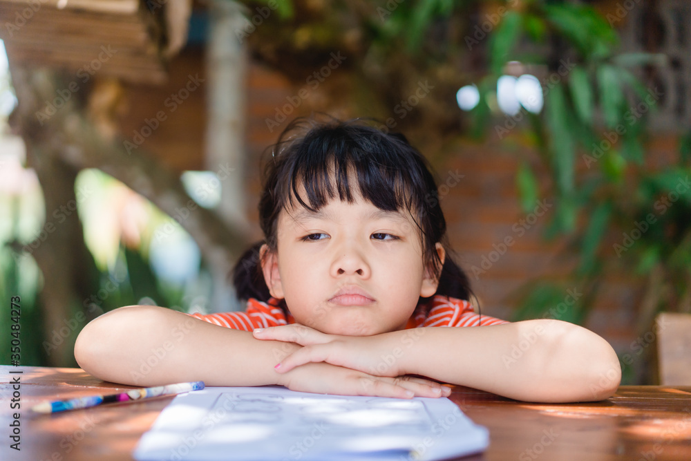 stressed out and tired asian kids girl stay at home and learn from home ...