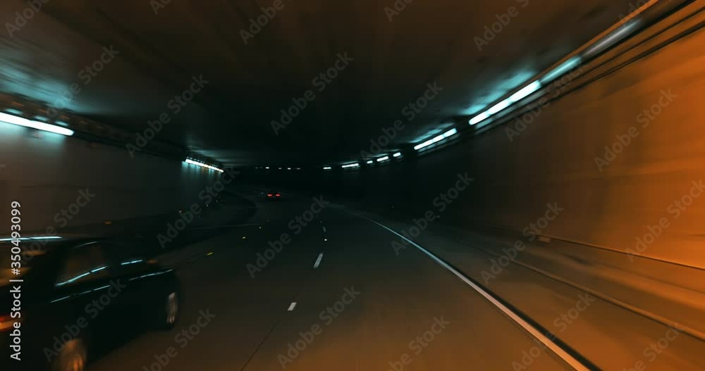 Driving through a yellow curving cinematic tunnel at the LAX airport ...