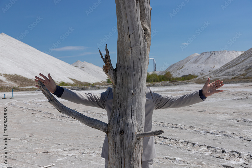 Ecological concept man and environmental pollution. Symbol of hope ...