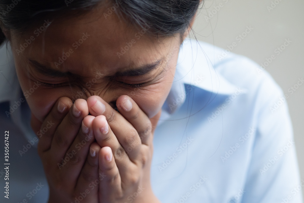 sick woman sneezing with sore throat; sick woman with allergic sneeze ...