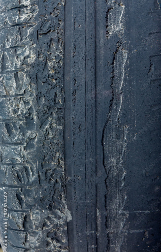 Profile of a worn out car tire. Stock Photo | Adobe Stock
