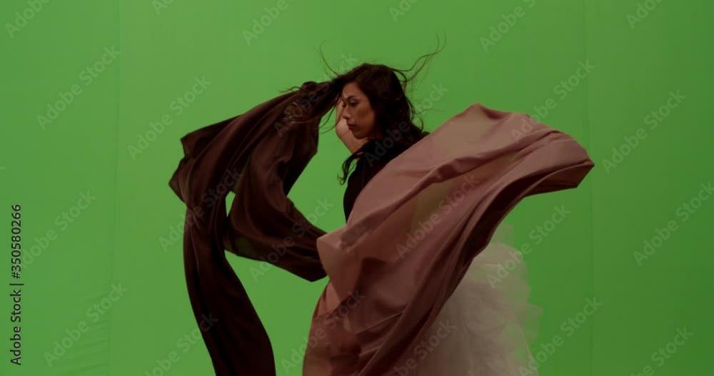 Close up portrait of beautiful fashion model dancer posing against ...