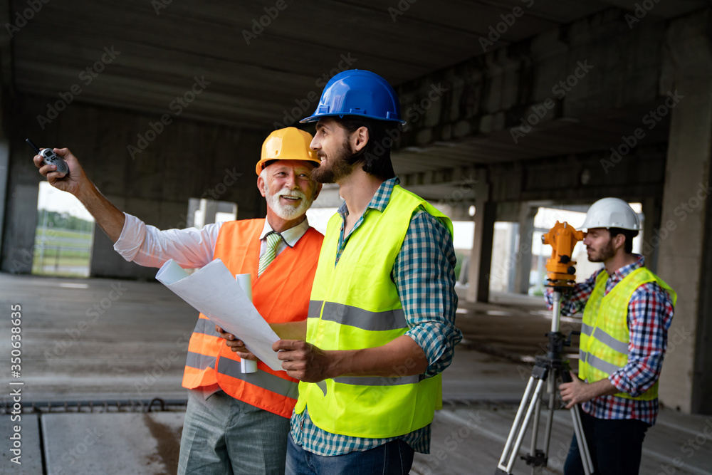 Engineer, contractor, architect teamwork. Construction people talking ...