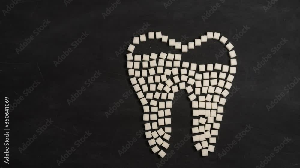 Sugar destroy tooth enamel leads tooth decay White Sugar cubes shape ...