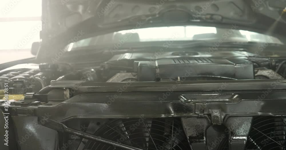 Washing car engine. Car wash service before and after washing. Cleaning ...