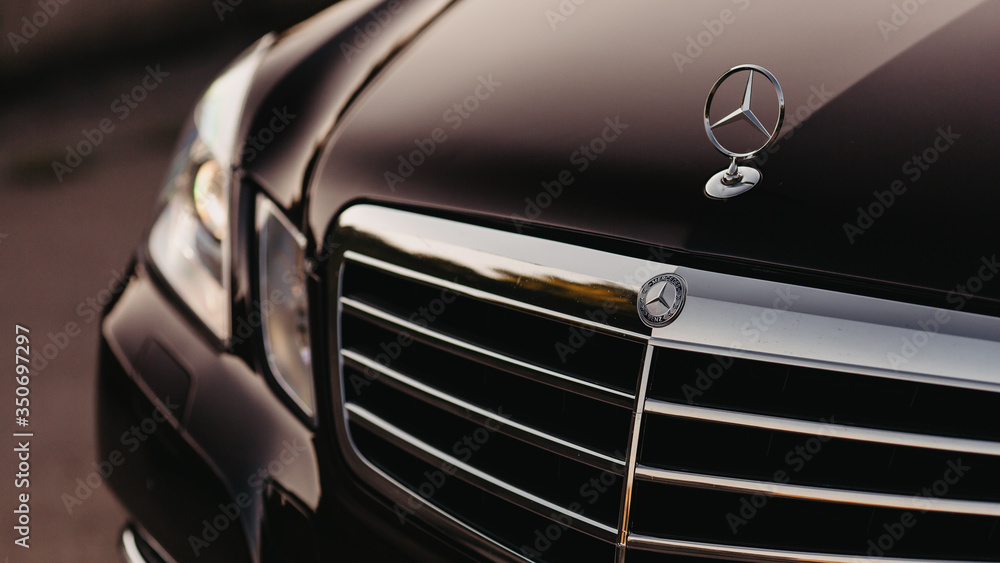 Original Mercedes-Benz E-Class logo and front grill. Stock Photo ...