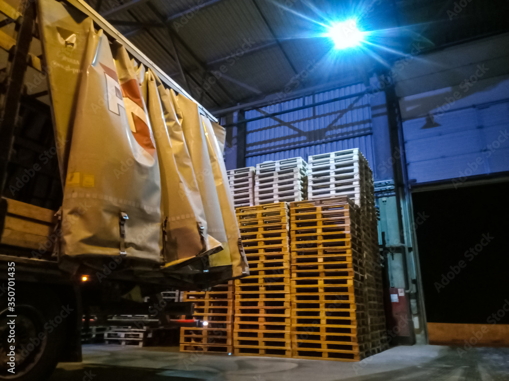 Pallet racks inside a cement plant. Loading shop of cement plant. Stock ...