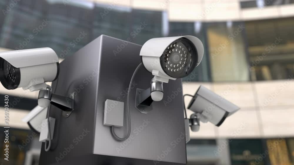 CCTV security system at the entrance to business center. The ...