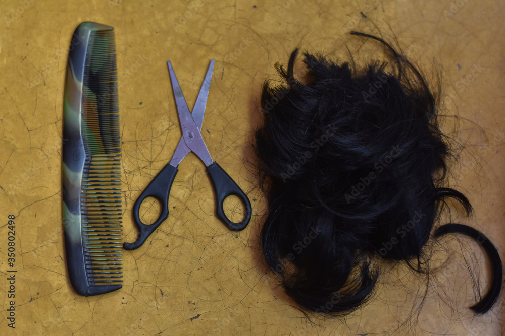 man cut hair and siger on the yellow floor, stay home and life during ...