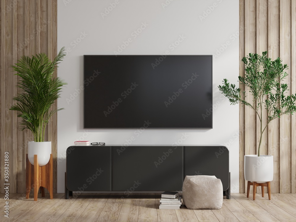 TV on wall and cabinet in modern living room on white wall background ...