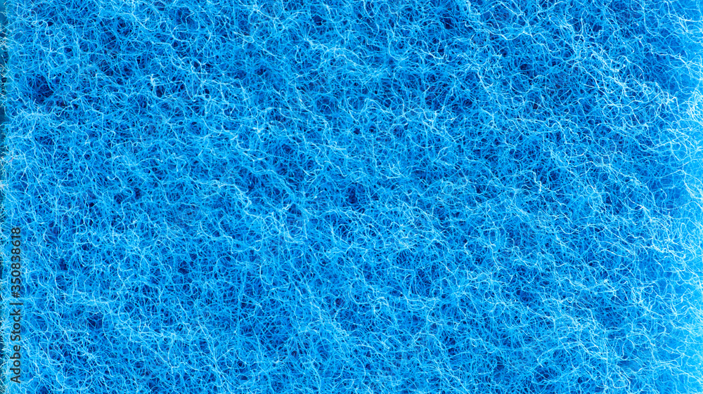 Background in the form of a porous structure in blue. Macro sponge ...
