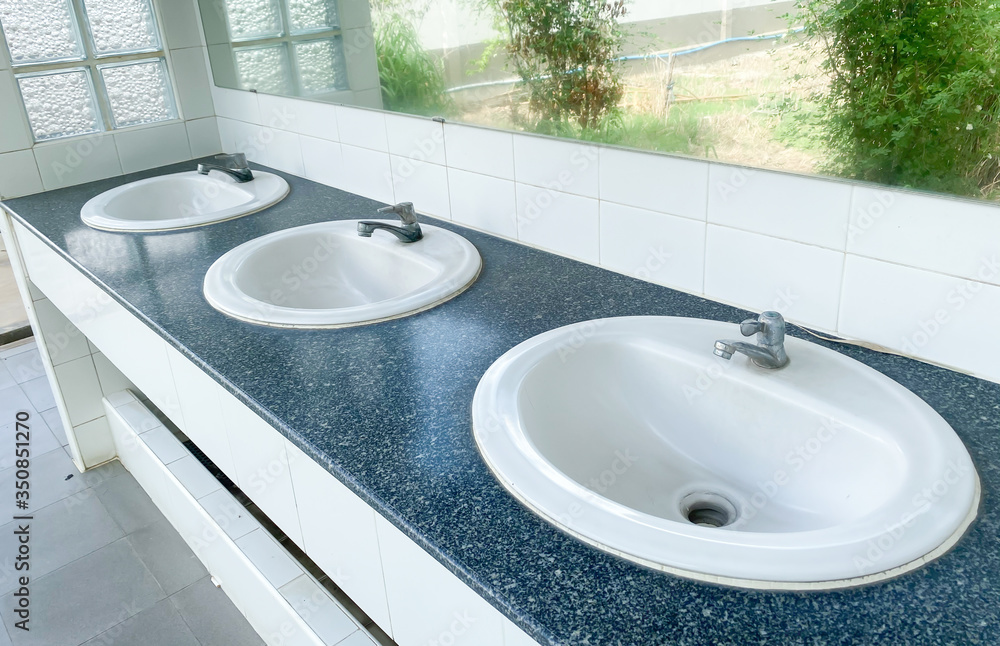 Public sinks, Handwashers for people using public toilets, Public ...
