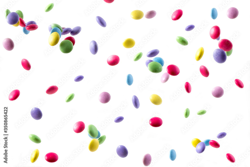 colorful sweets falling on white background Stock Photo | Adobe Stock