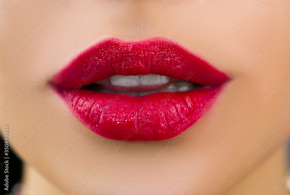 Beautiful red lips close-up. Classic red lips with sexy smirk. Textured ...