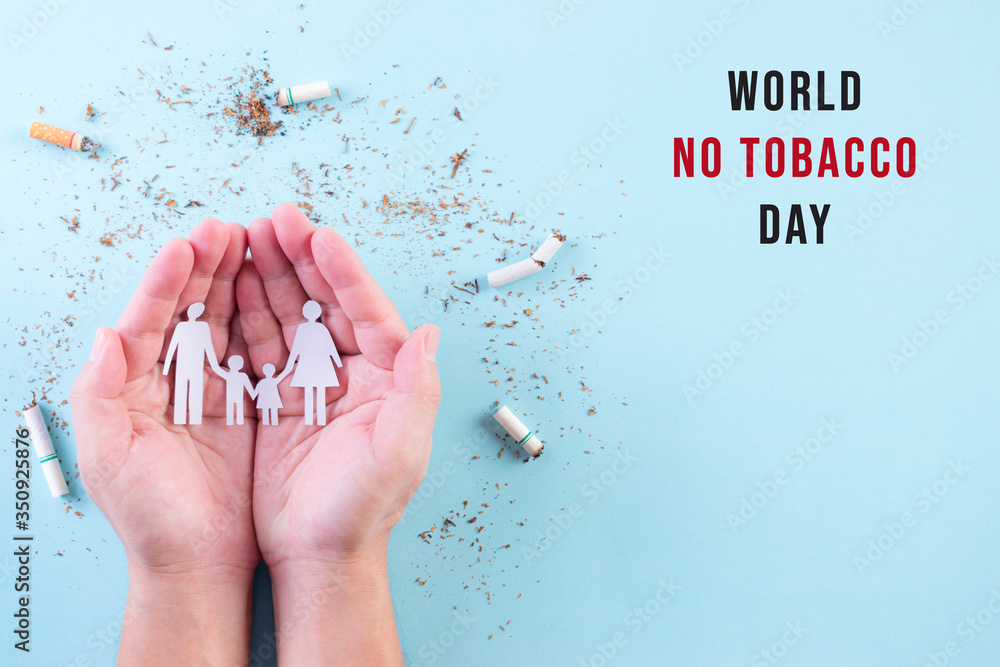 Hand protect family from cigarette on light blue background. Stop ...