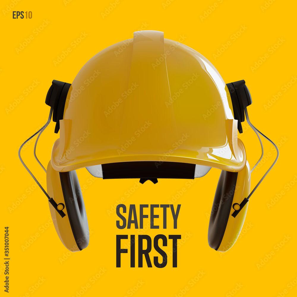 Safety first concept. Isolated yellow hard hat with ear defenders ...