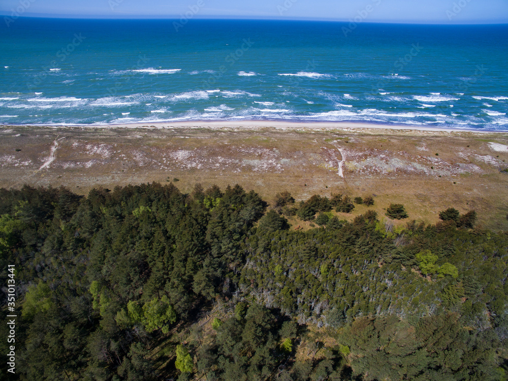 Aerial view with dunes, forest and sea in Curonian spit on a sunny day ...