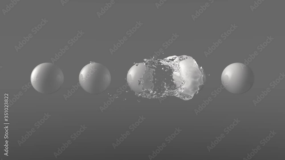 Water orb envelops white spheres. Water beautifully wraps around white ...