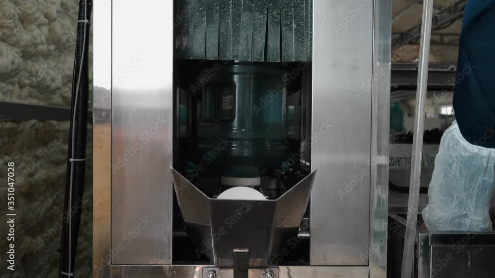 Pure water plant, men in special uniforms and protective masks work ...