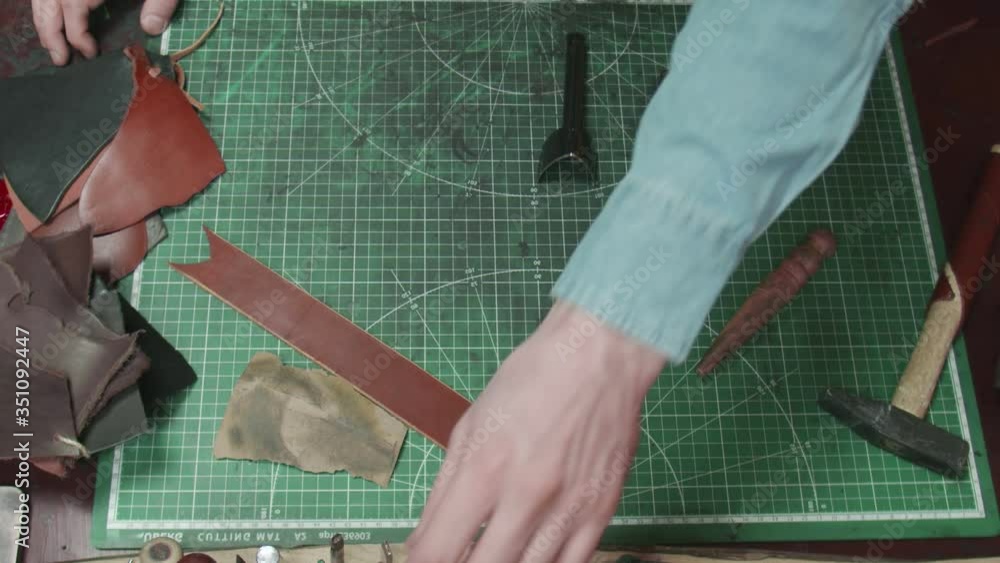 Top view of worktop in leather workshop with different tools Stock ...