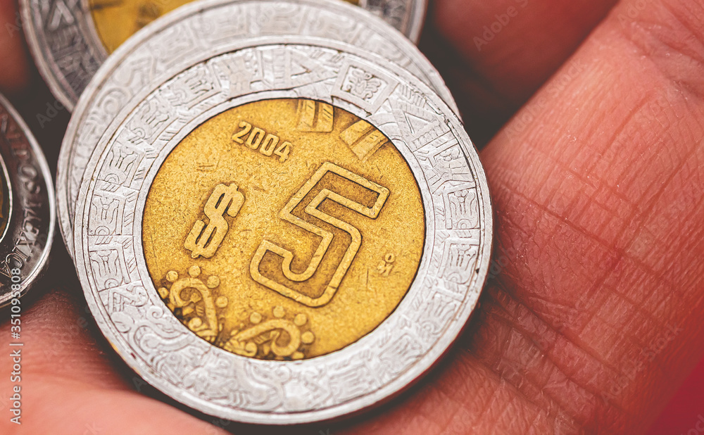Mexican peso ( peso mexicano ). Currency of México. Man holding in hand ...