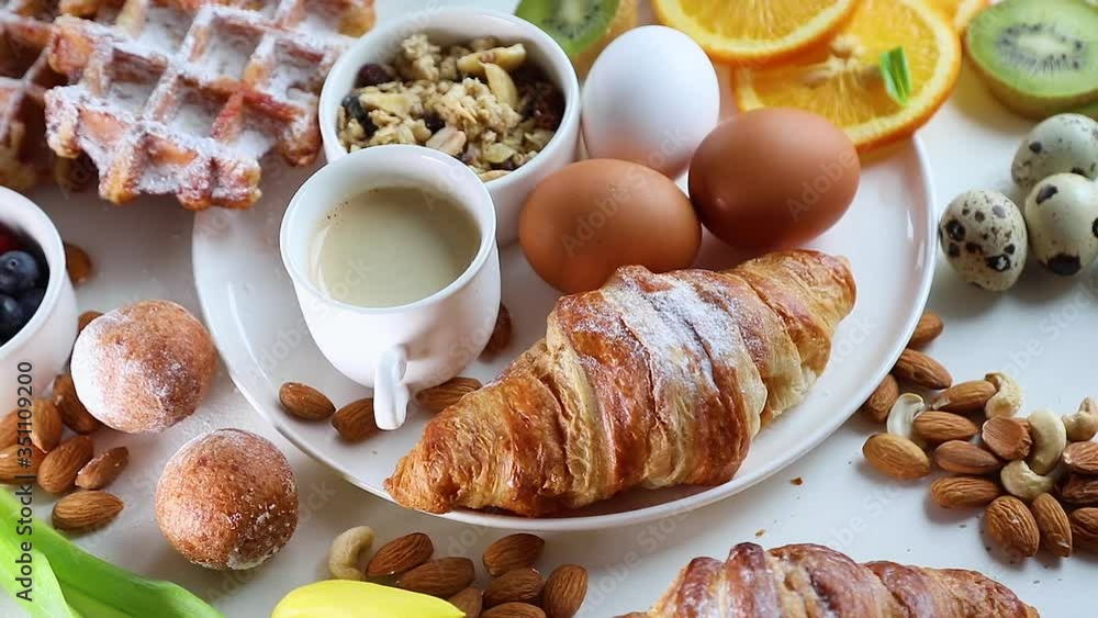 Breakfast with boiled eggs. Top view, rotation Stock Video | Adobe Stock