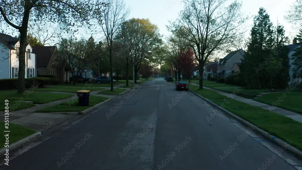 Aerial view of sunrise (sunset) in american suburb. Establishing shot ...