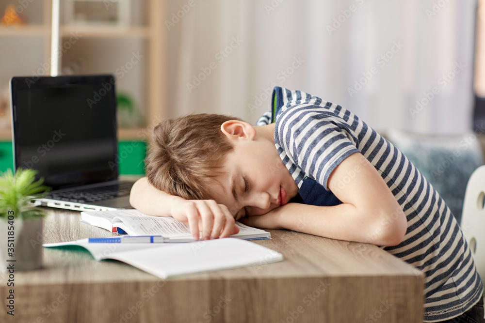 children, education and learning concept - tired student boy sleeping ...