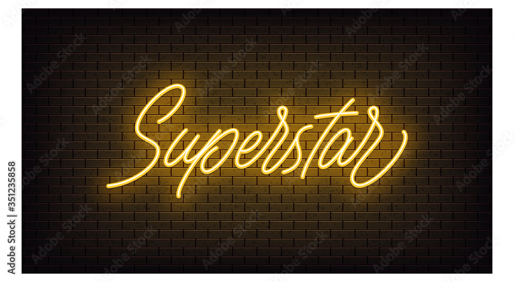 Yellow neon Superstar, lettering. Neon text of Superstar on black brick ...