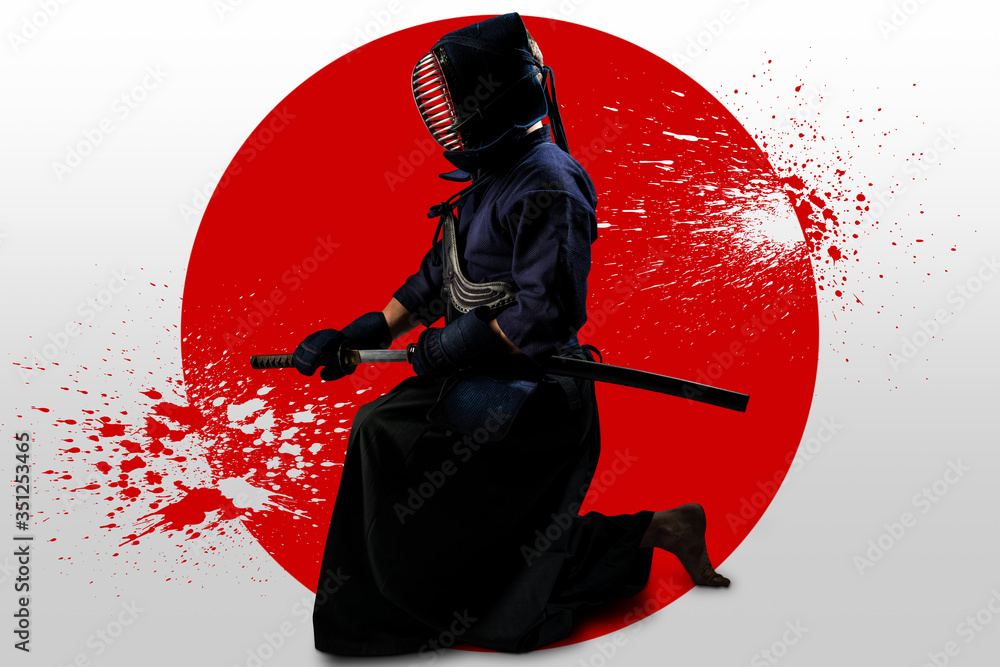 Male in tradition kendo armor with Samurai sword katana on red moon ...