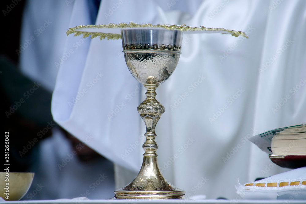 Consecration of bread and wafer wine Stock Photo | Adobe Stock
