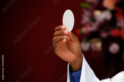 Consecration of bread and wafer wine Stock Photo | Adobe Stock