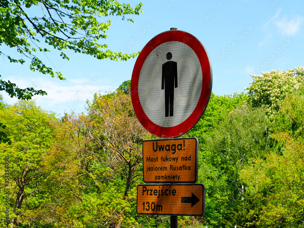 pedestrian traffic is prohibited. metal road sign with a round shape ...