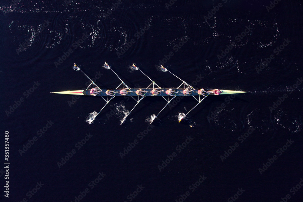 Elevated view of female's rowing eight in water Stock Photo | Adobe Stock