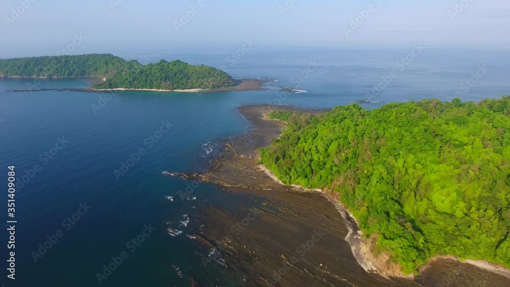 Forward Flying Aerial View of Jicaron Island (Coiba Park) Water Edge ...