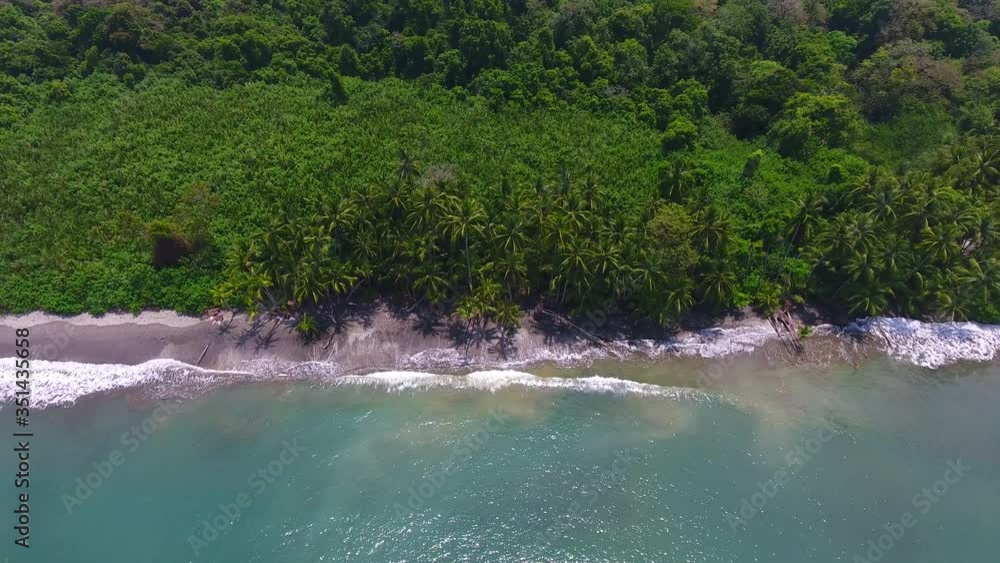 Side Strafe Flying Aerial View of Jicaron Island (Coiba Park) Water ...