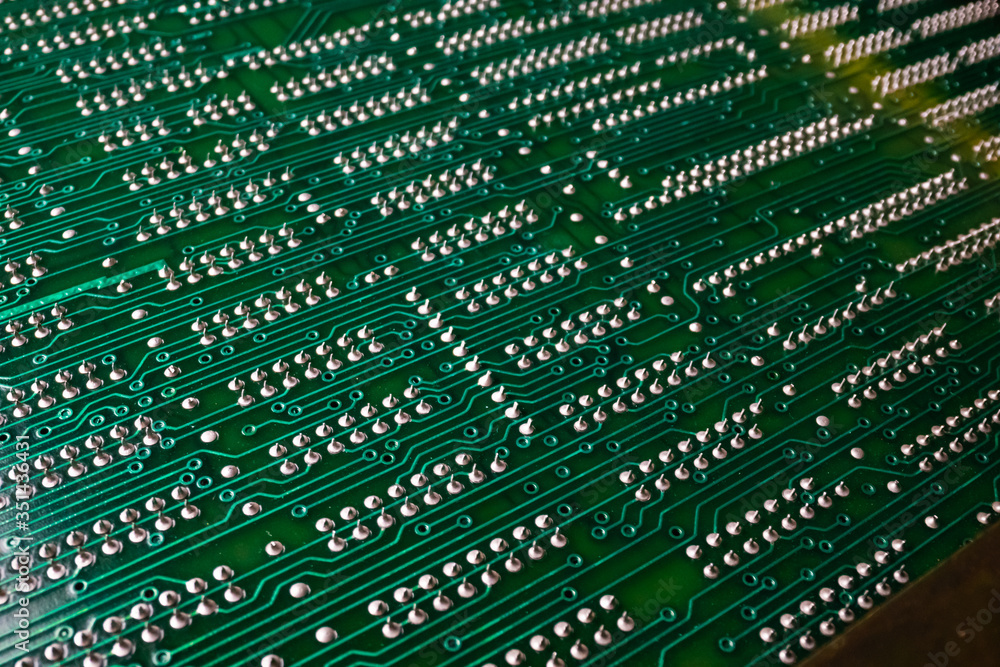 Extreme detailed view of printed circuit board and components in the ...