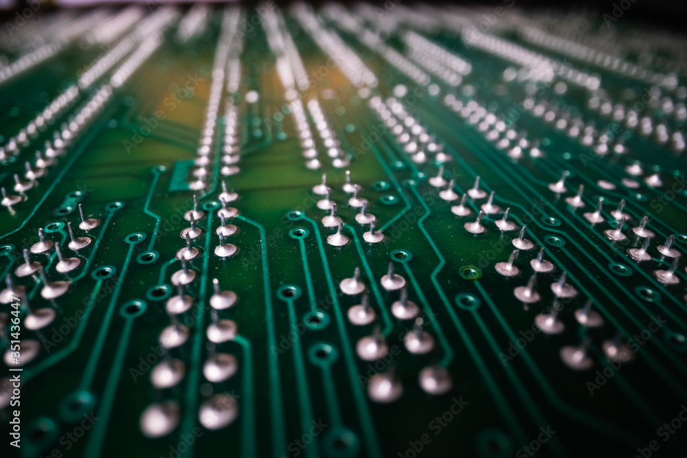 Extreme detailed view of printed circuit board and components in the ...