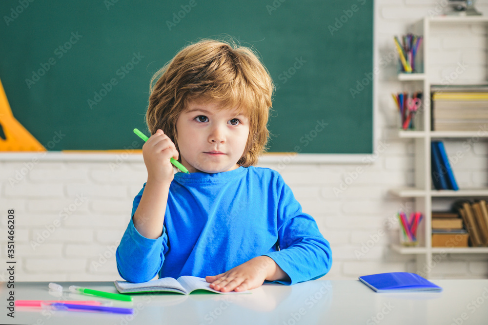 Little child at school lesson. Kids gets ready for school. School ...