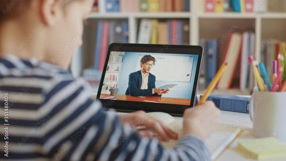 Smart Little Boy Uses Digital Tablet for Video Call with His Teacher ...