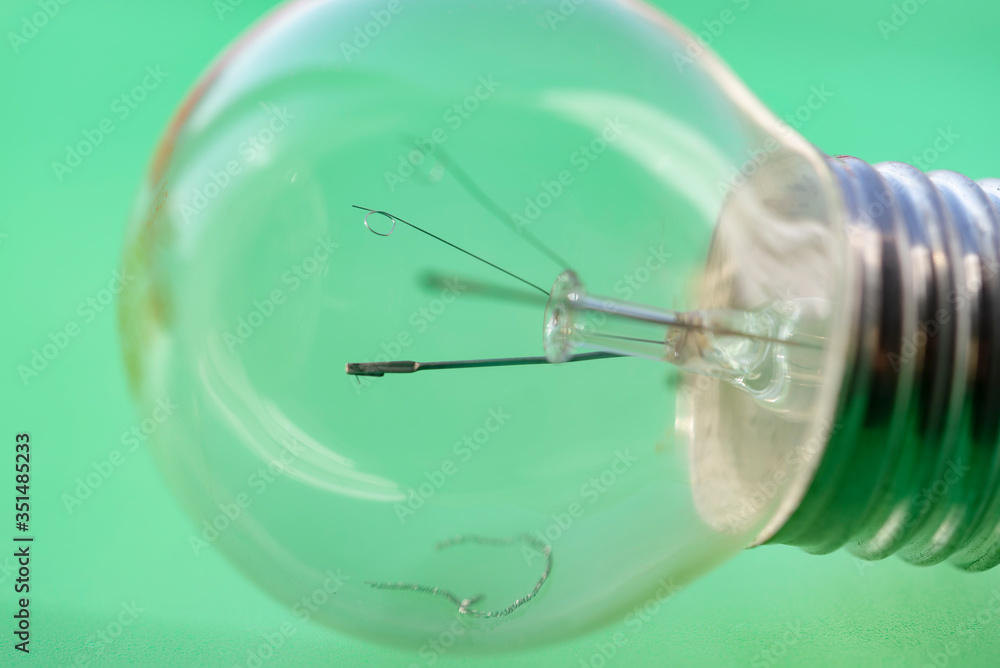 Transparent filament spherical light bulb which is currently no longer ...