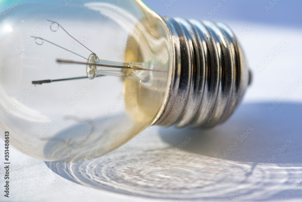 Transparent filament spherical light bulb which is currently no longer ...