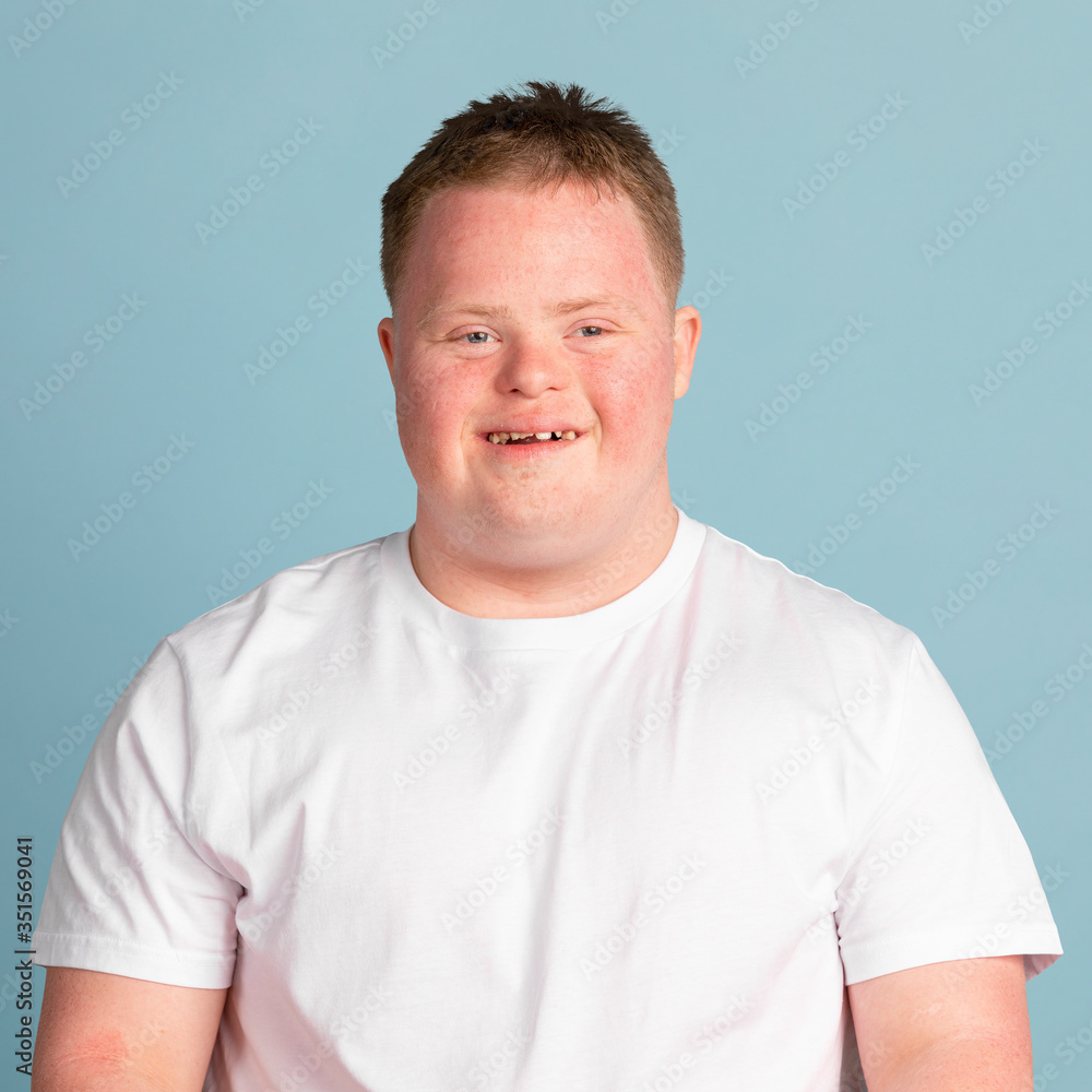 Cute boy with down syndrome Stock Photo | Adobe Stock