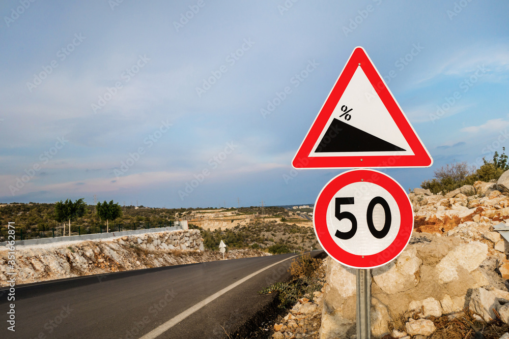 International traffic signs 'Steep descent' & 'Speed limit to 50 ...