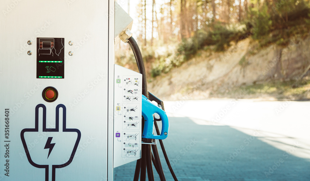 Electric car charging point. Different types of plugins. Parking with ...