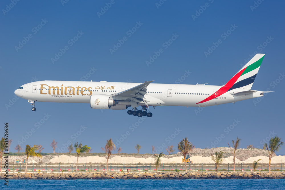 Emirates Boeing 777-300ER airplane Male airport on the Maldives Stock ...