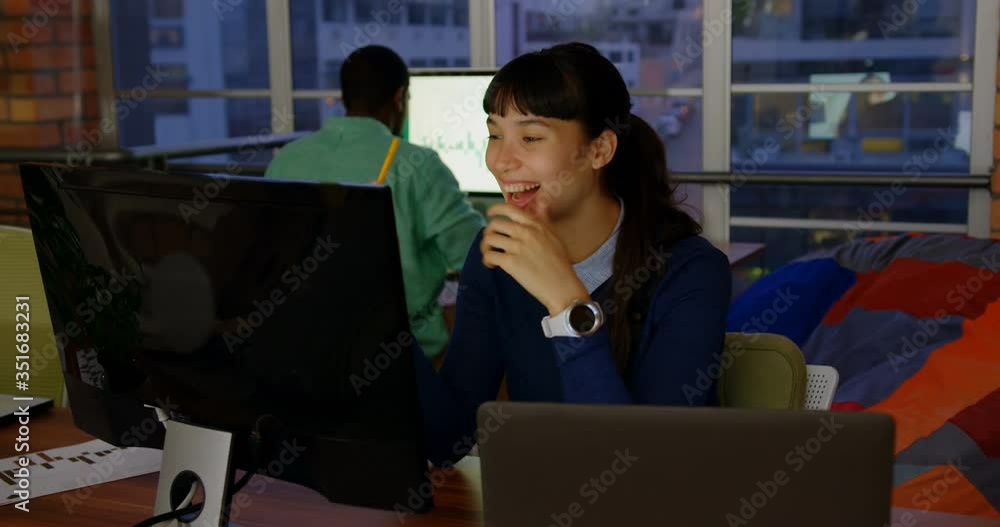 Businesswoman making video call on computer in a modern office Stock ...