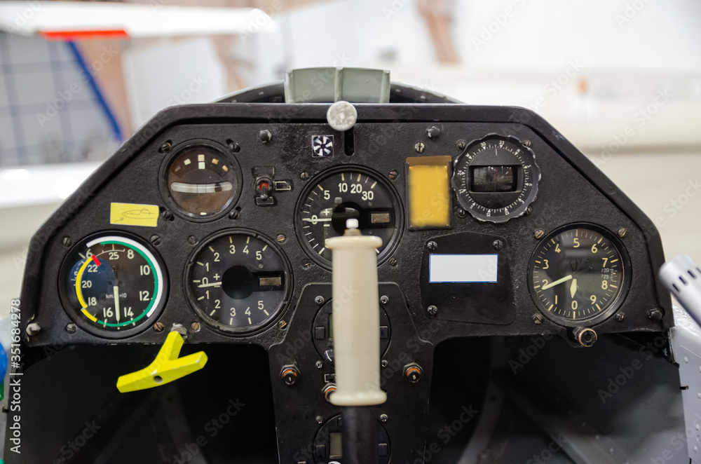Instrument panel inside the cockpit of a glider inside the hangar ...