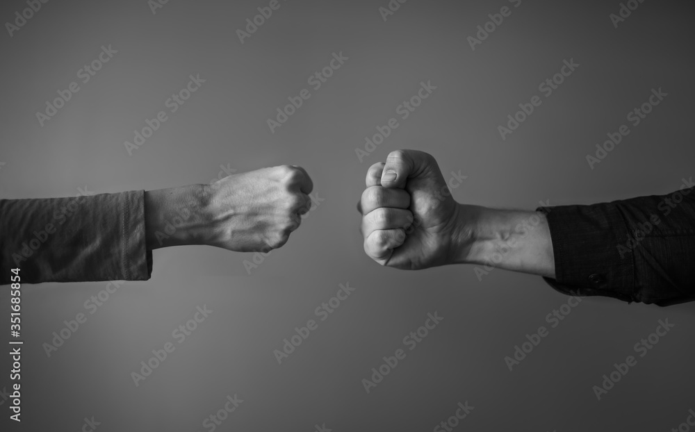 fist bump, teamwork, working together concept. Stock Photo | Adobe Stock